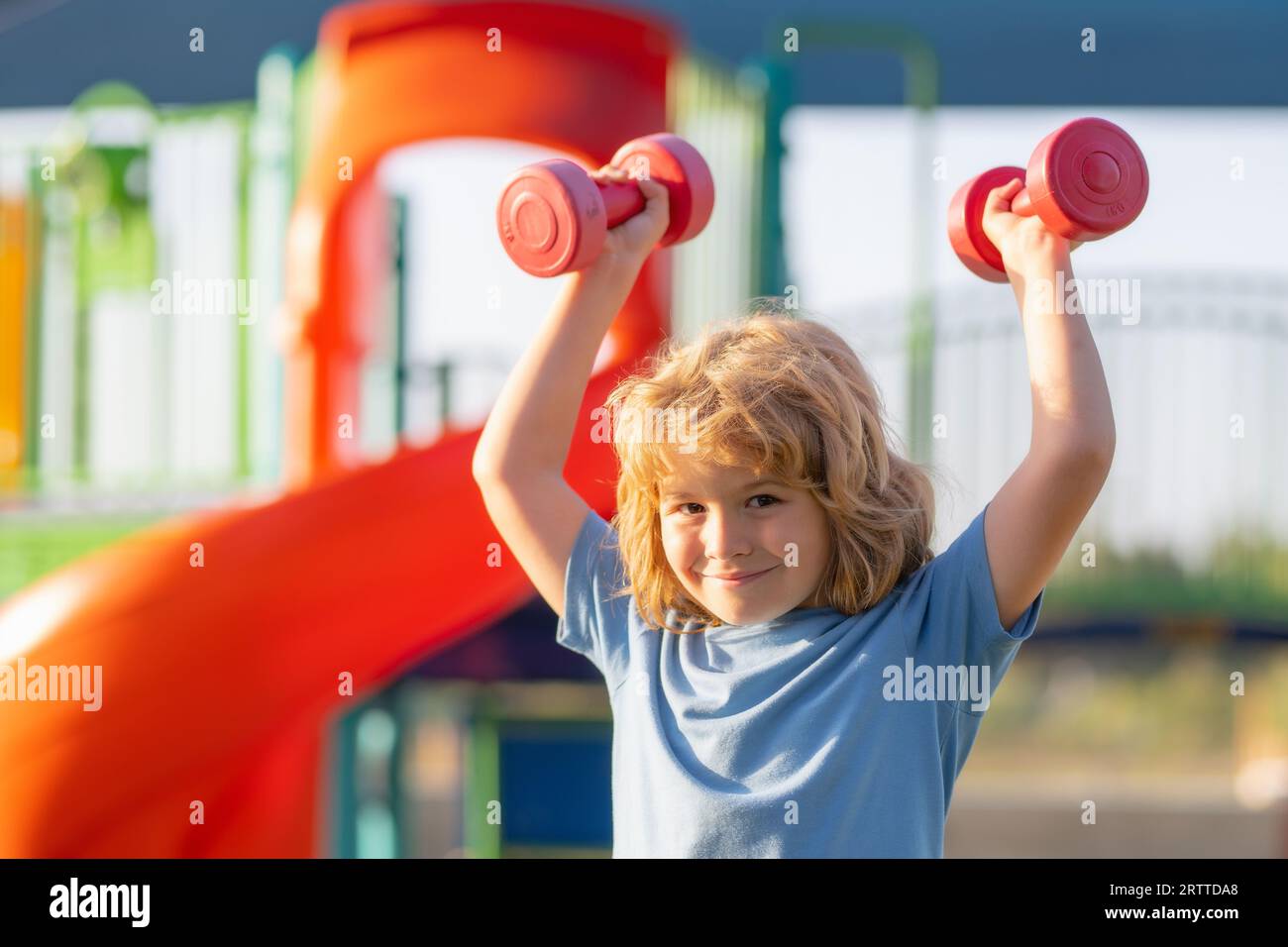 Summer sport, kids sport training on playground. Cute little boy doing ...