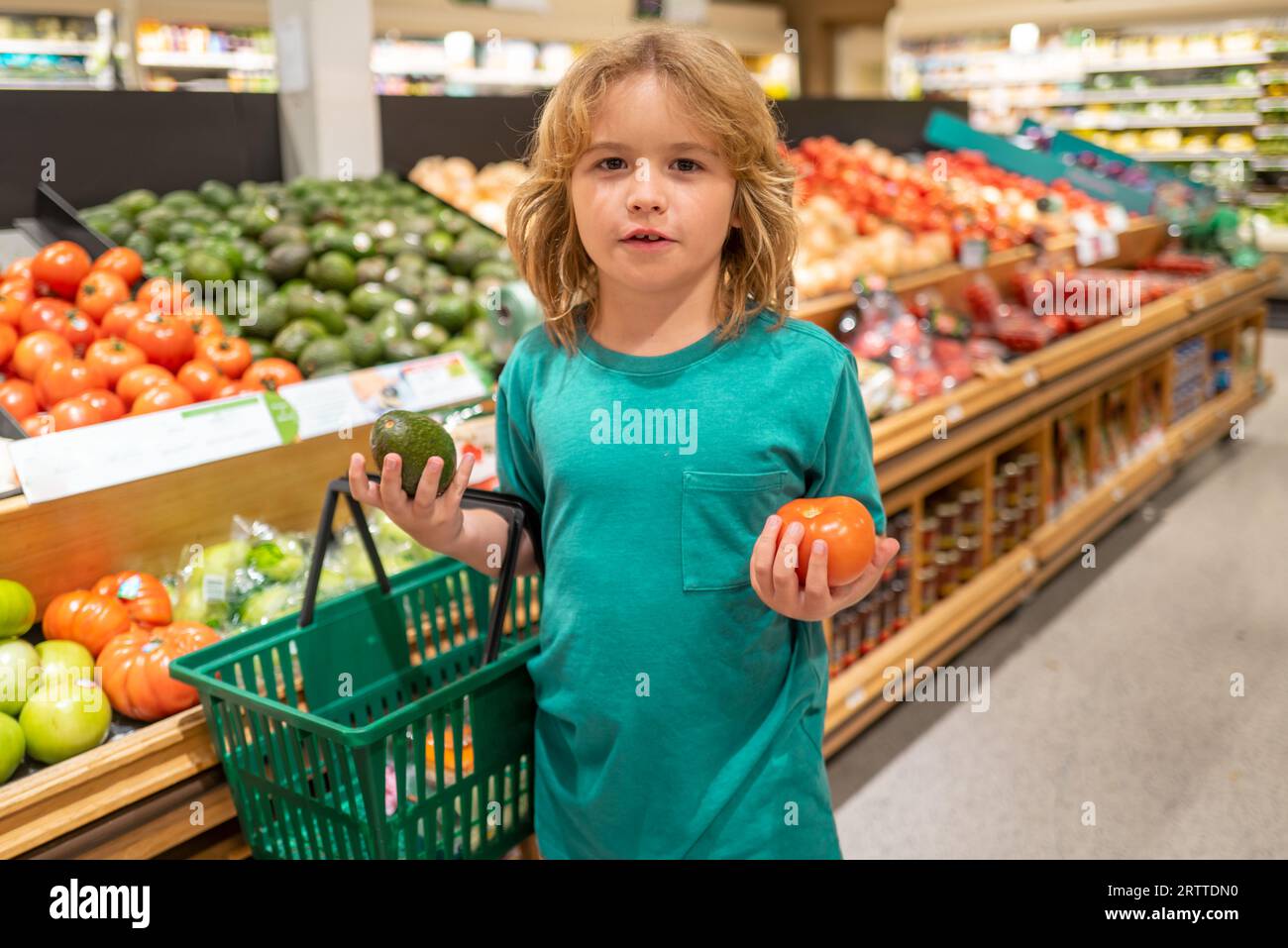 Healthy food for kids. Portrait of smiling little child with shopping ...