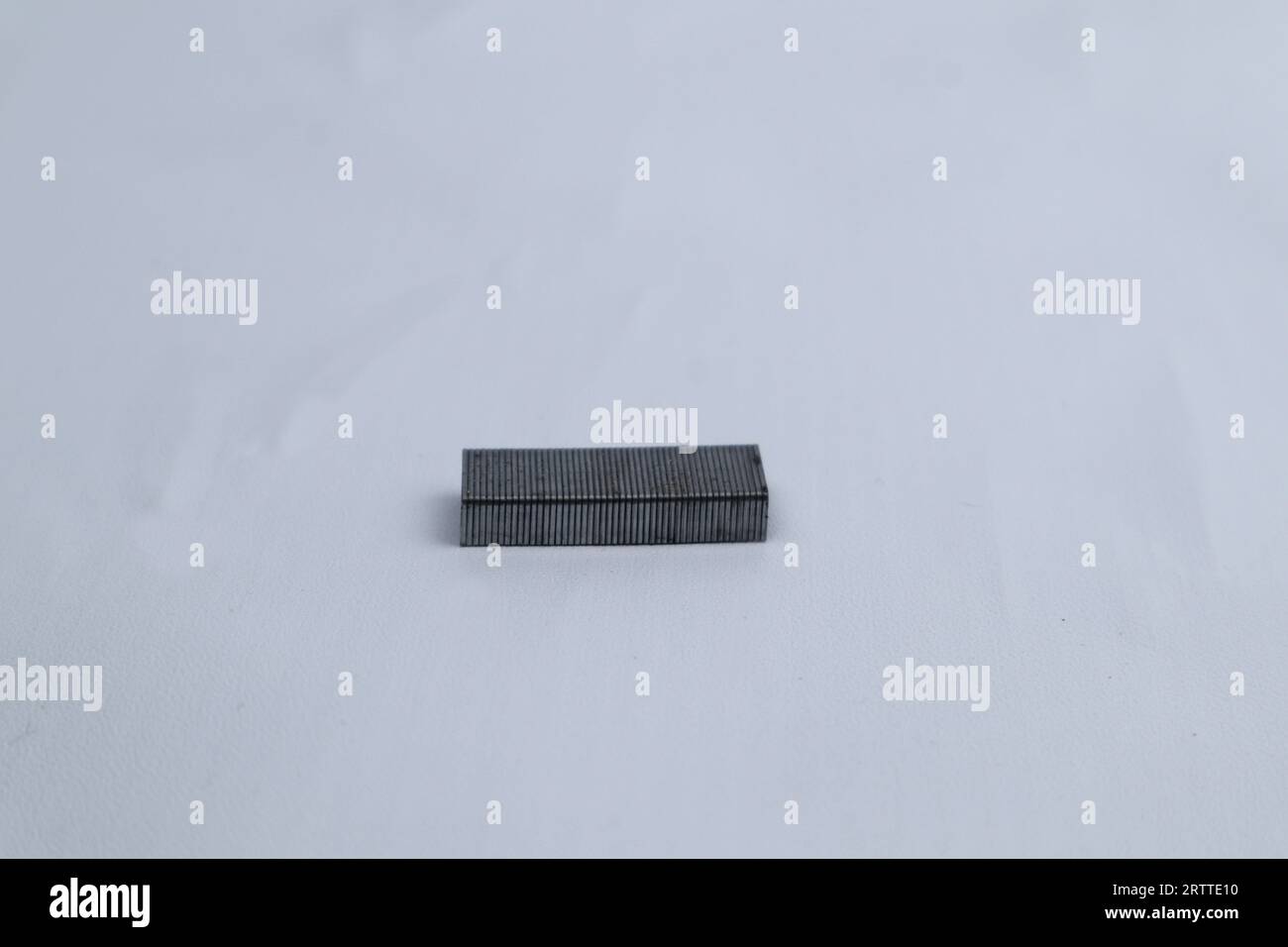 Stapler bullet isolated on white background Stock Photo - Alamy