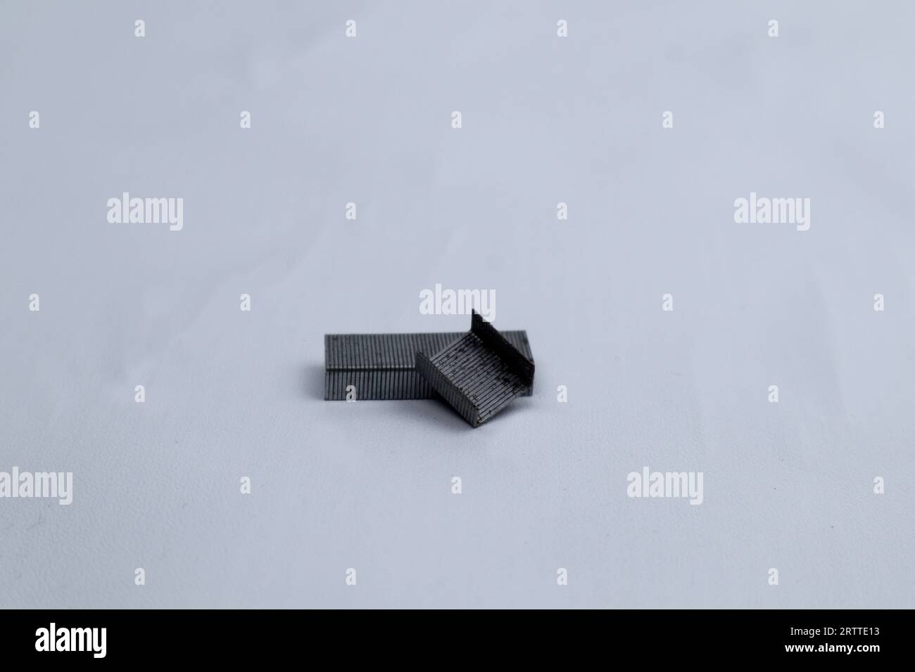 Stapler bullet isolated on white background Stock Photo - Alamy