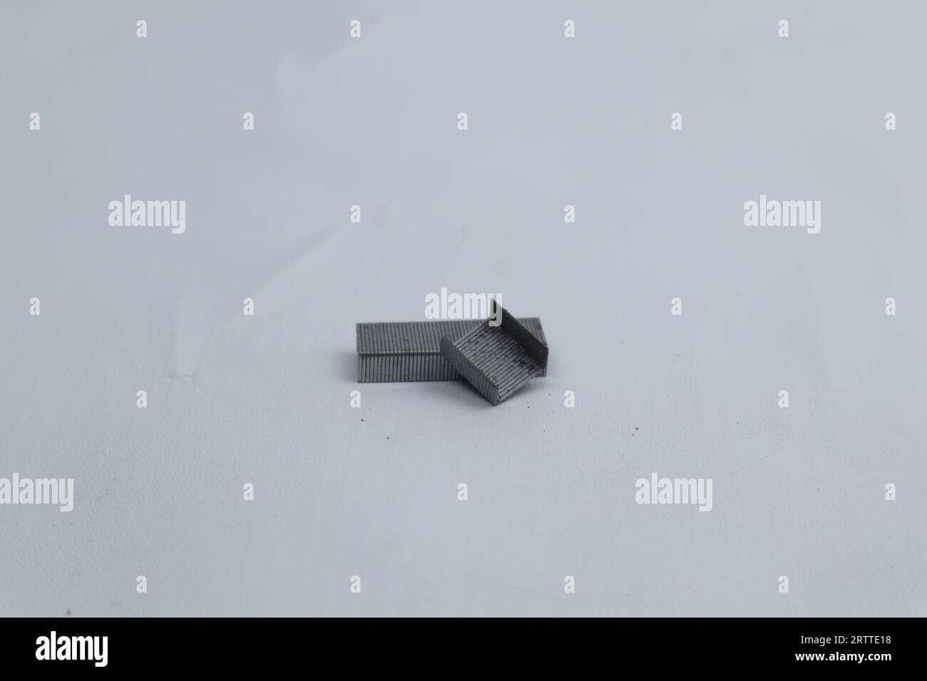 Stapler bullet isolated on white background Stock Photo - Alamy