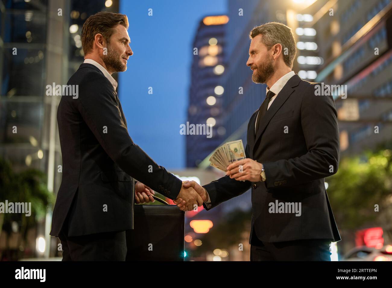 Corrupted business man money outdoor hi-res stock photography and ...