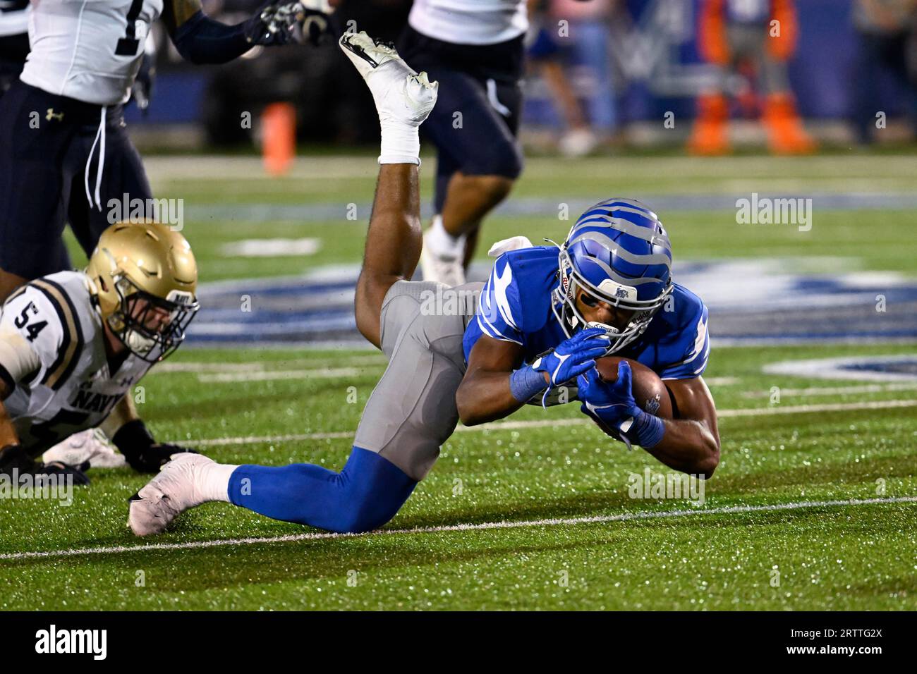 Memphis running back Blake Watson (4) gains yardage against Navy during ...