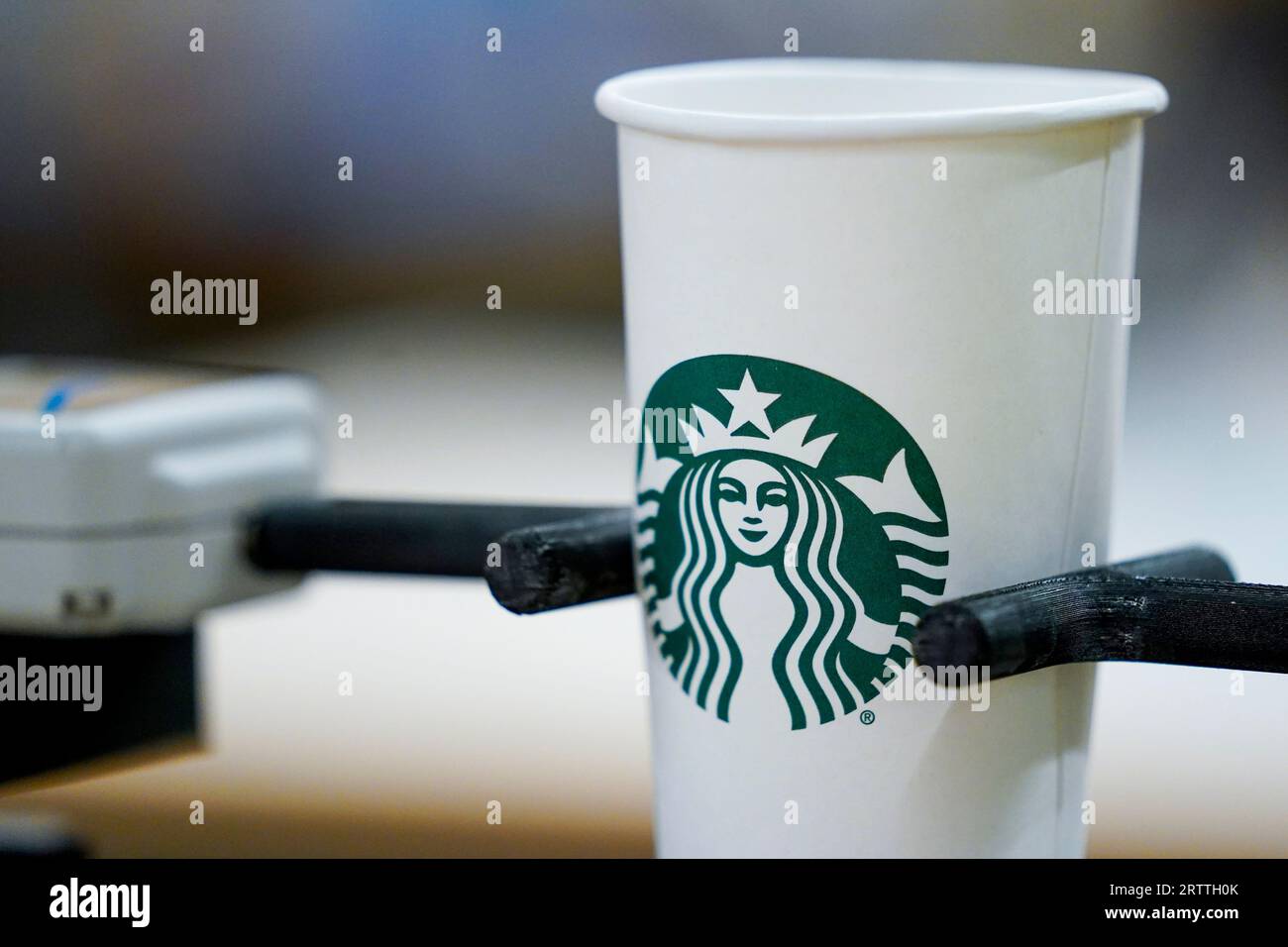 A single-use cup undergoes a rigidity test at the Tryer Center at ...