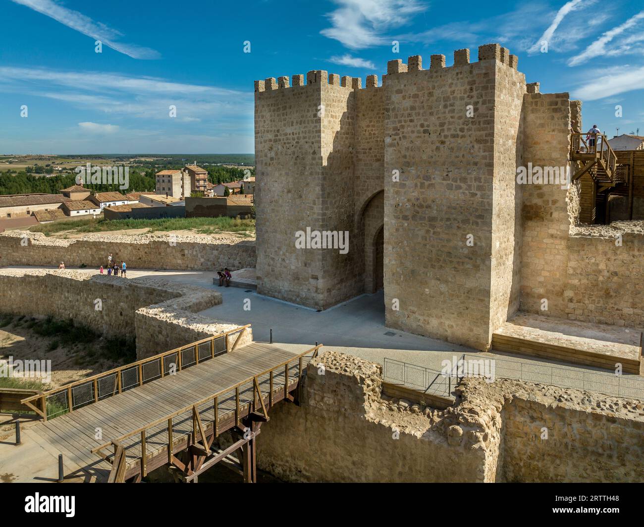 Aerial view of Almazan city walls, fortified gate, battlements above ...