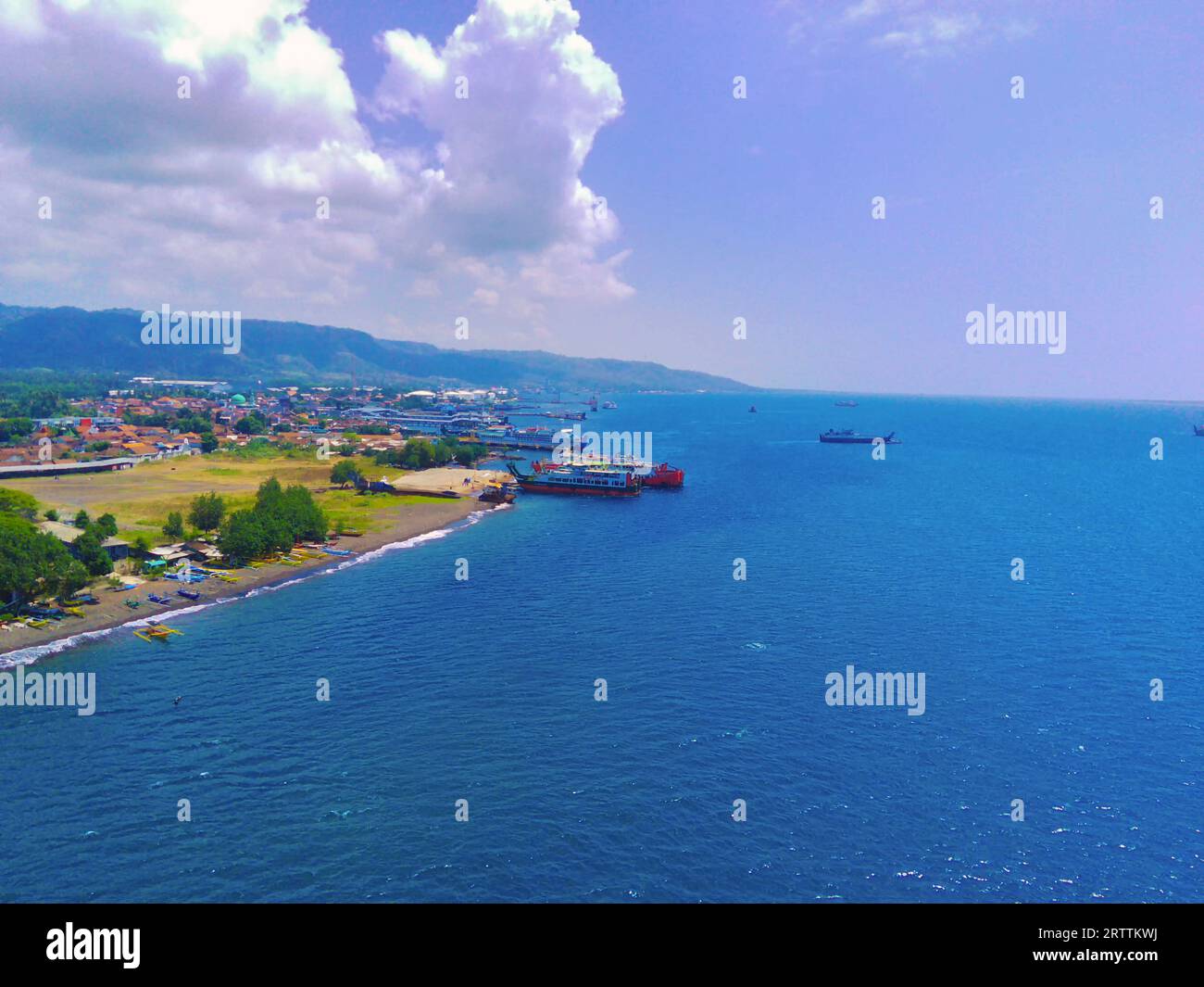 The coastal cityscape and sea port of Ketapang, Banyuwangi during the ...