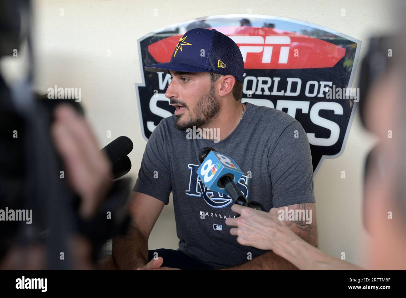 Tampa Bay Rays pitcher Zach Eflin talks with reporters in the dugout ...