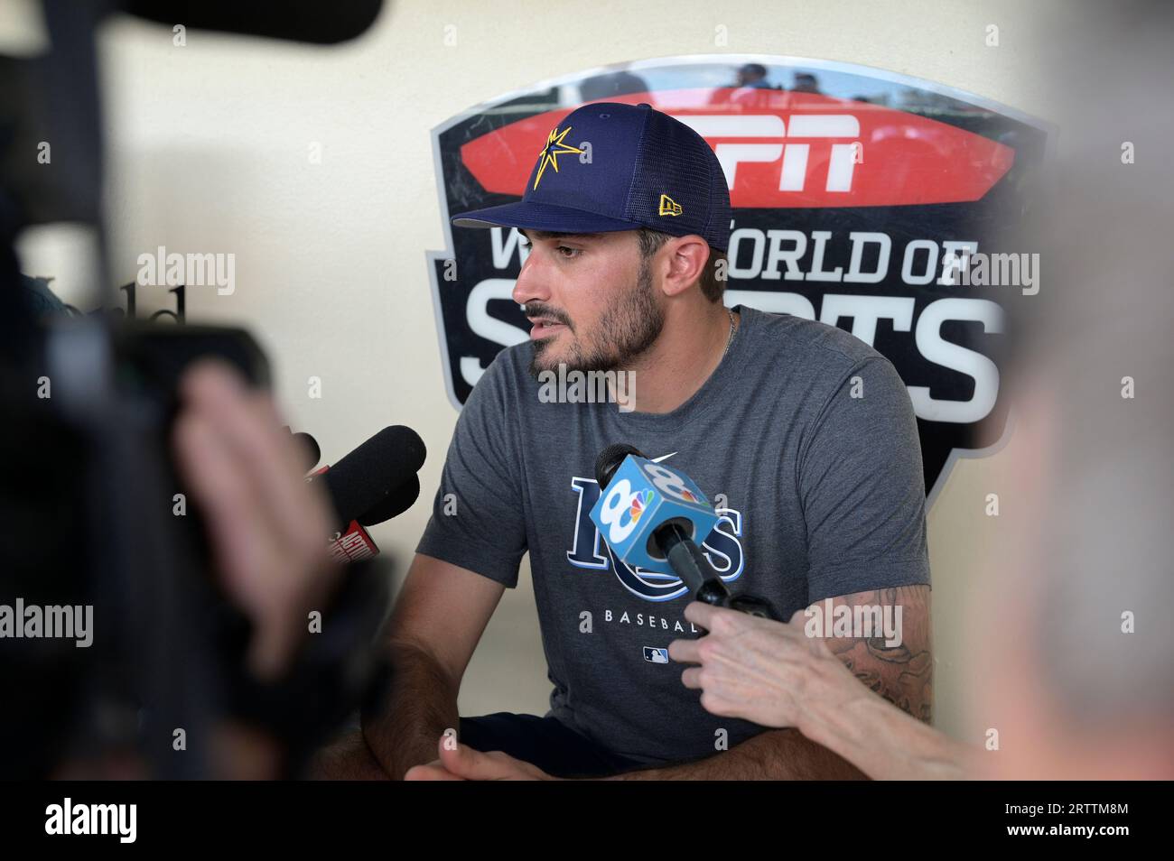 Tampa Bay Rays pitcher Zach Eflin talks with reporters in the dugout ...