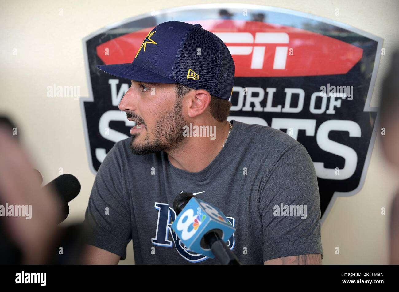 Tampa Bay Rays pitcher Zach Eflin talks with reporters in the dugout ...