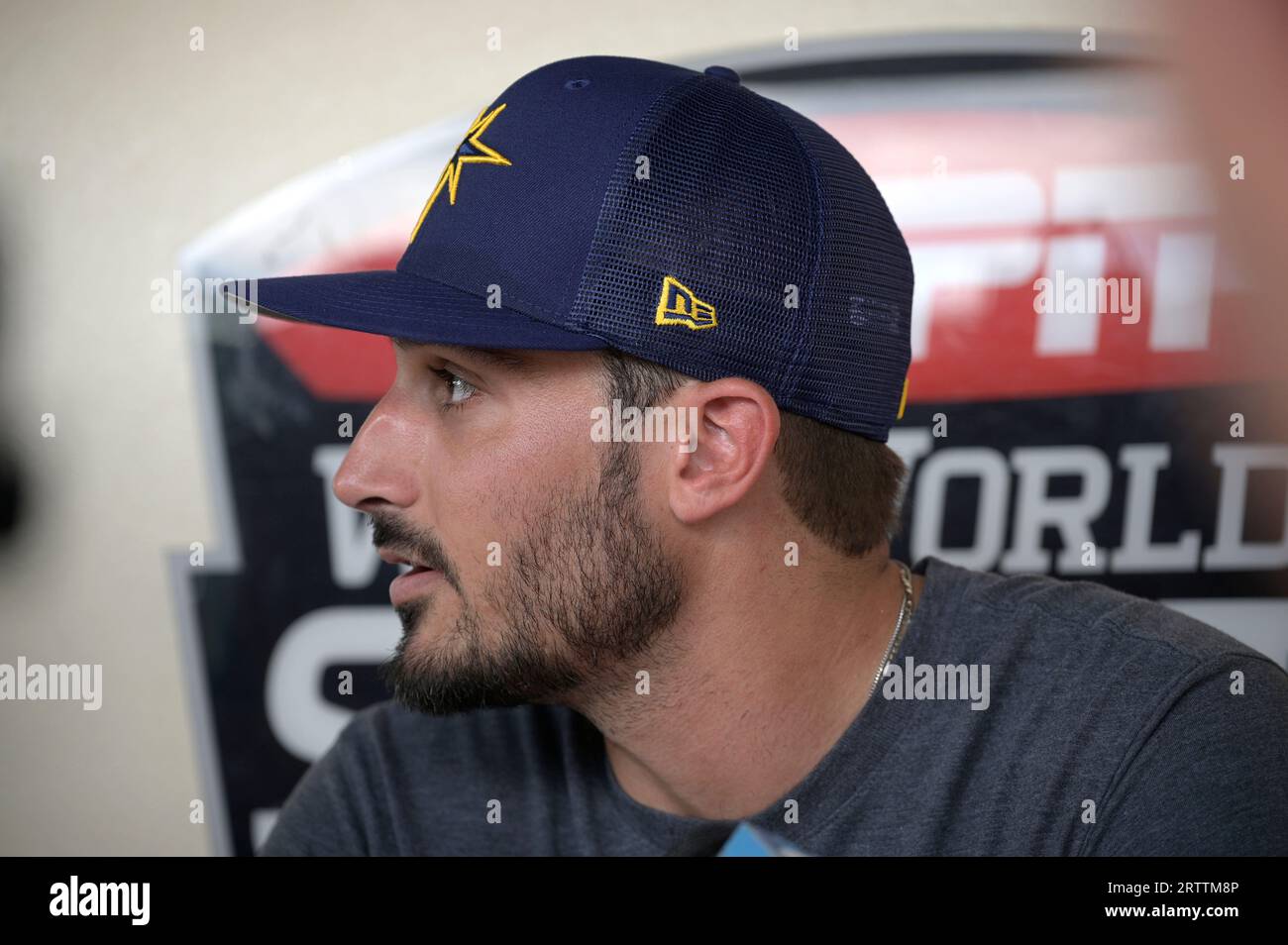 Tampa Bay Rays pitcher Zach Eflin talks with reporters in the dugout ...