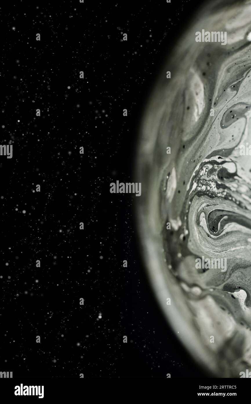 Soap bubble as a virtual grey alien planet in universe on dark ...