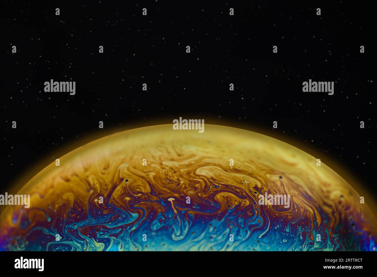 Soap bubble as a virtual planet space.. Multi-colored alien futuristic ...
