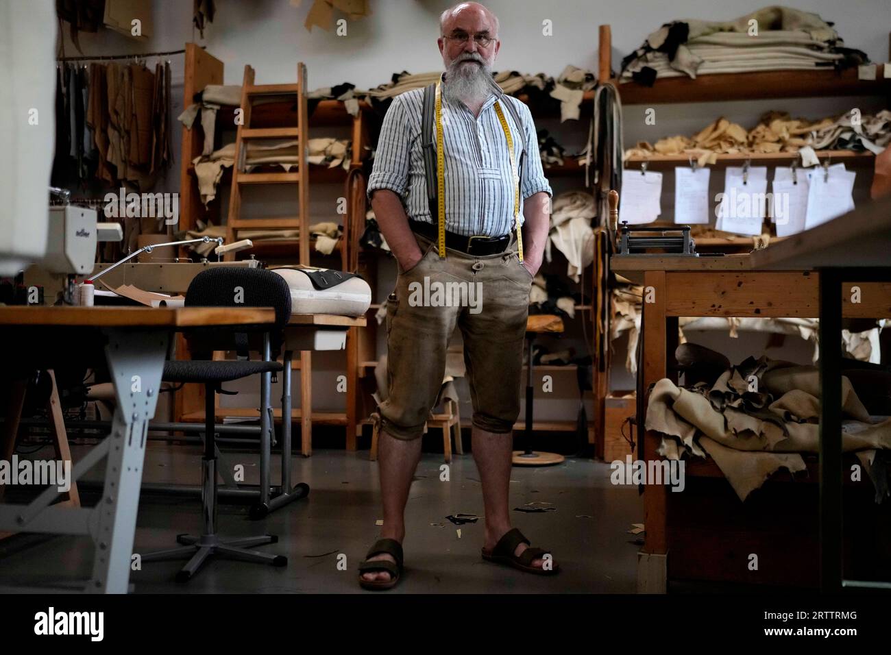 Saddler Klaus Bensmann works in his store in Bad Hindelang, Germany ...
