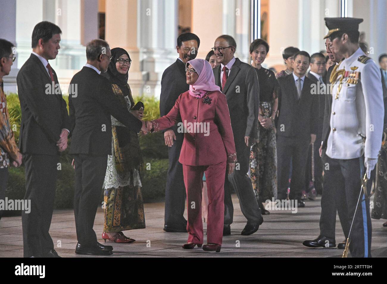 Madam Halimah Yacob, the eighth president of Singapore, and her husband ...
