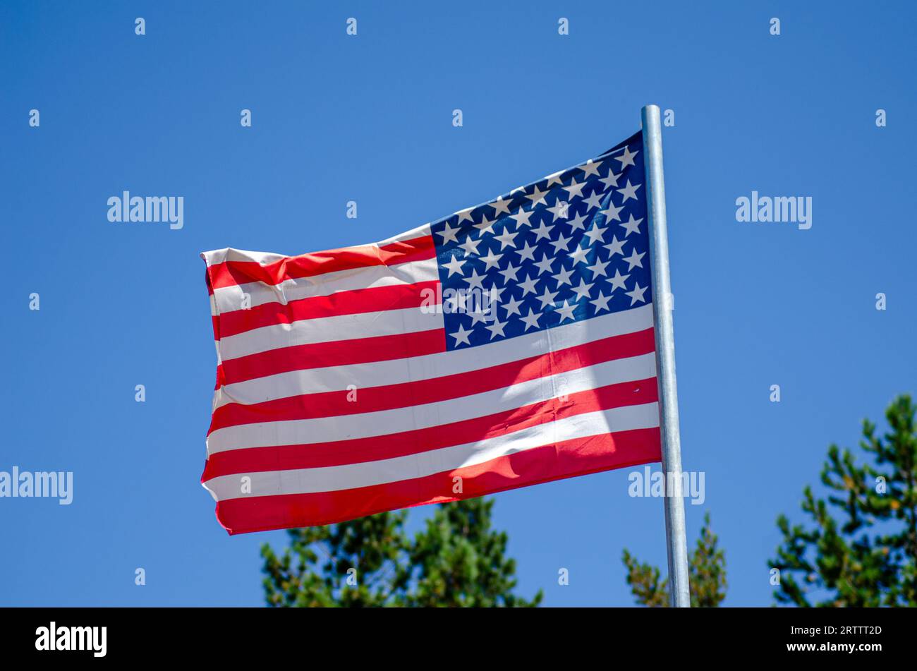 Flag of USA waving in the wind on a summer's day Stock Photo - Alamy