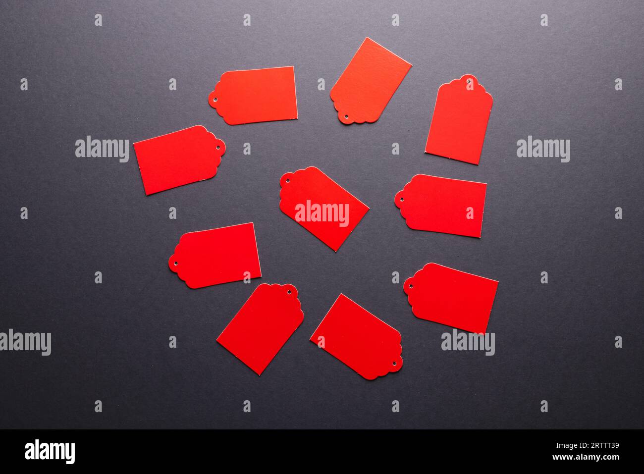 Red price tags with copy space on black background Stock Photo - Alamy
