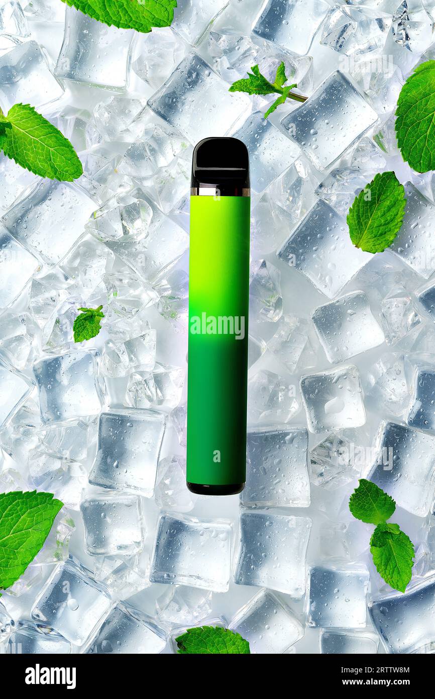 Disposable electronic cigarette on ice cubes background Stock Photo - Alamy
