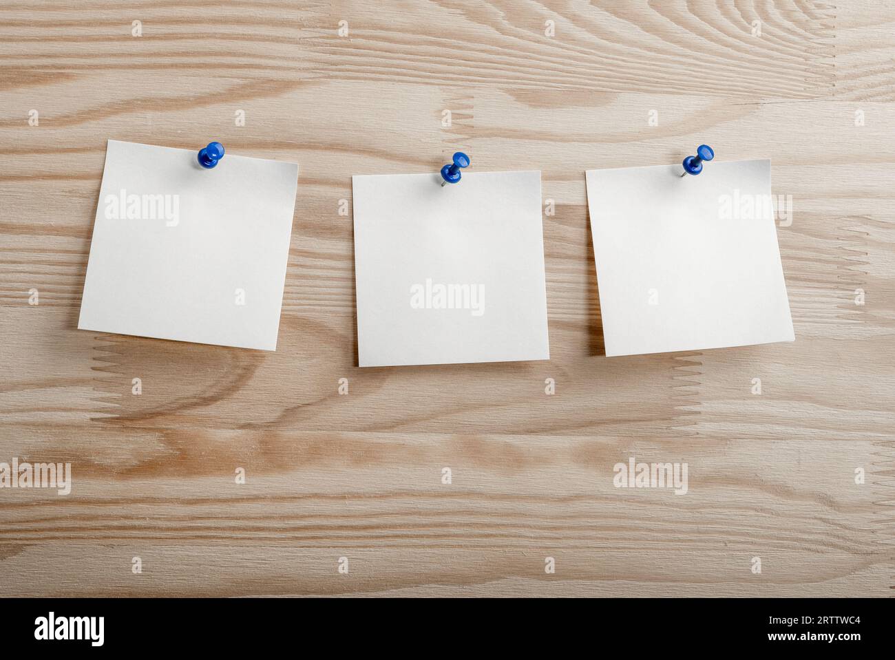 Three white paper notes mockup pinned to wooden bulletin board. sticky ...