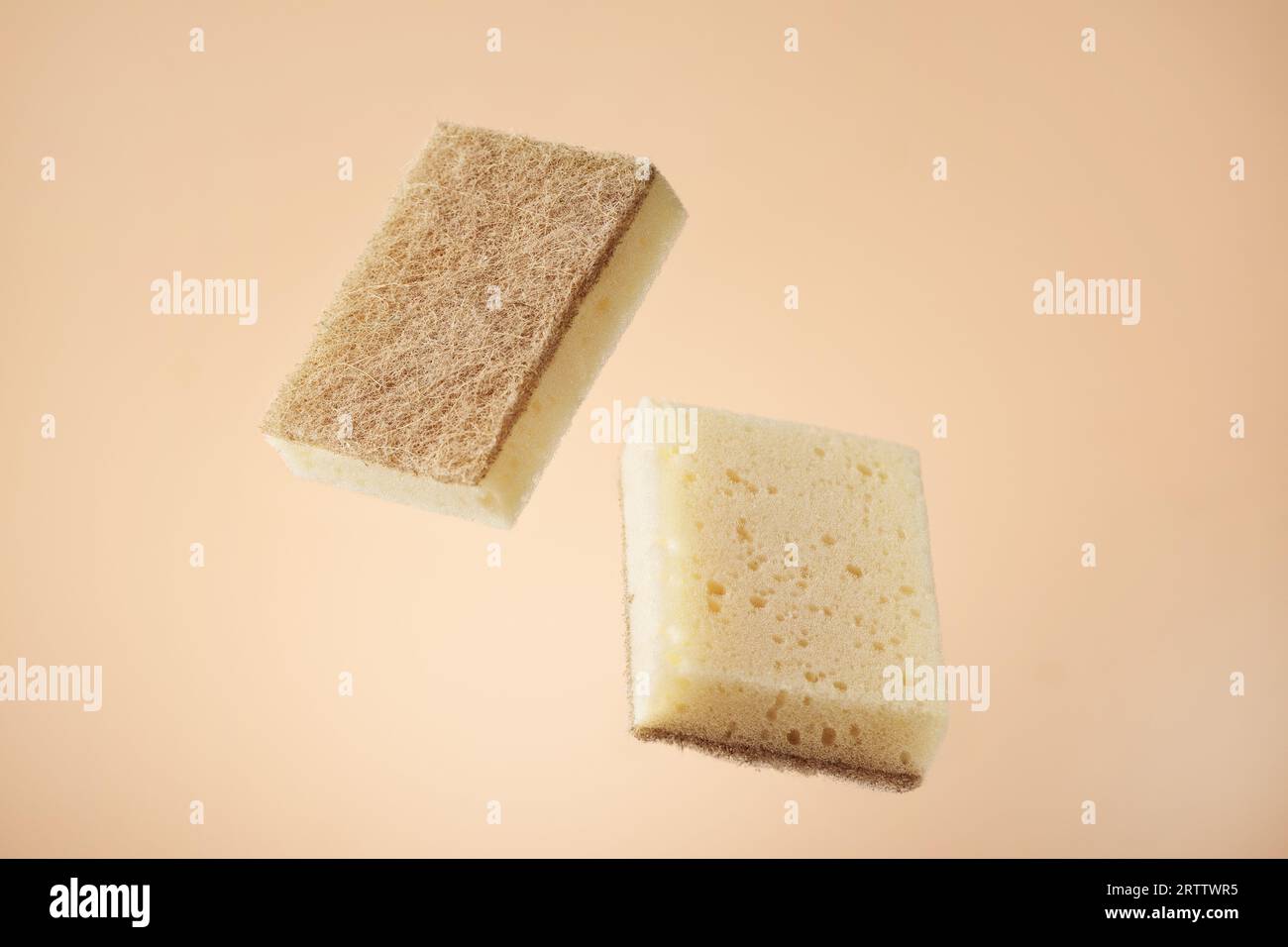 Natural dishwashing sponge over beige background. Eco friendly ...