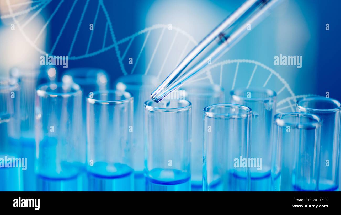 Test tubes with blue liquid water samples and pipette over blue ...