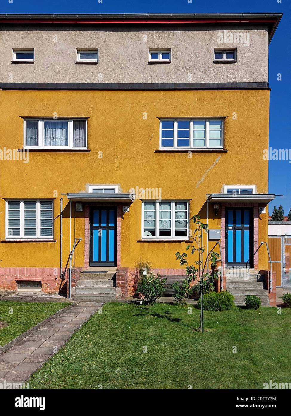 Facade of row housing in the district Reform in Magdeburg, Germany ...