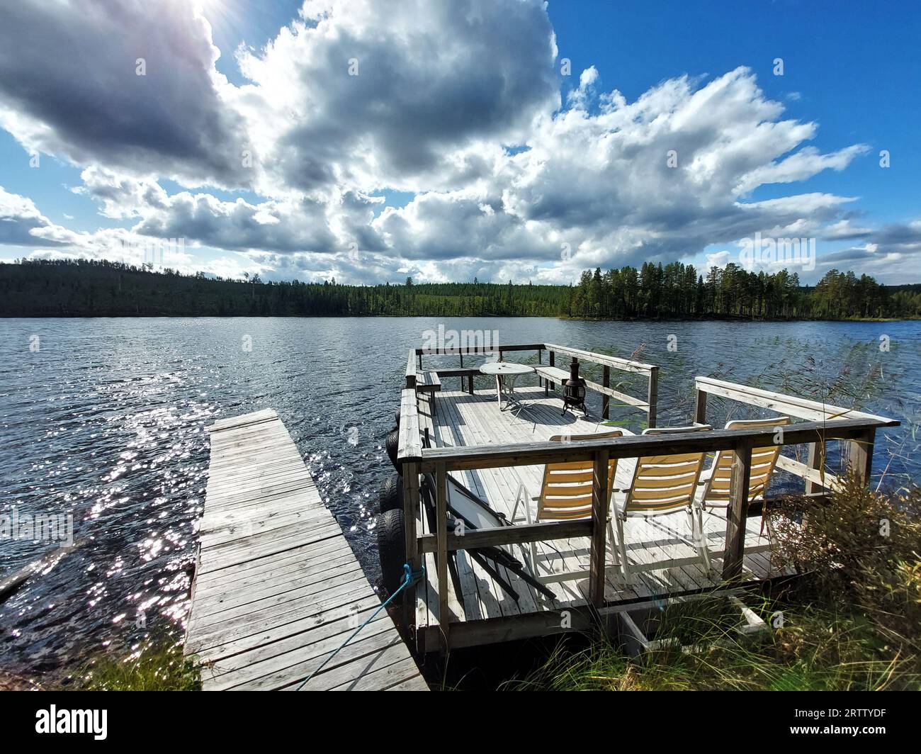 Floating recreation platform at pier on a Swedish lake Stock Photo - Alamy