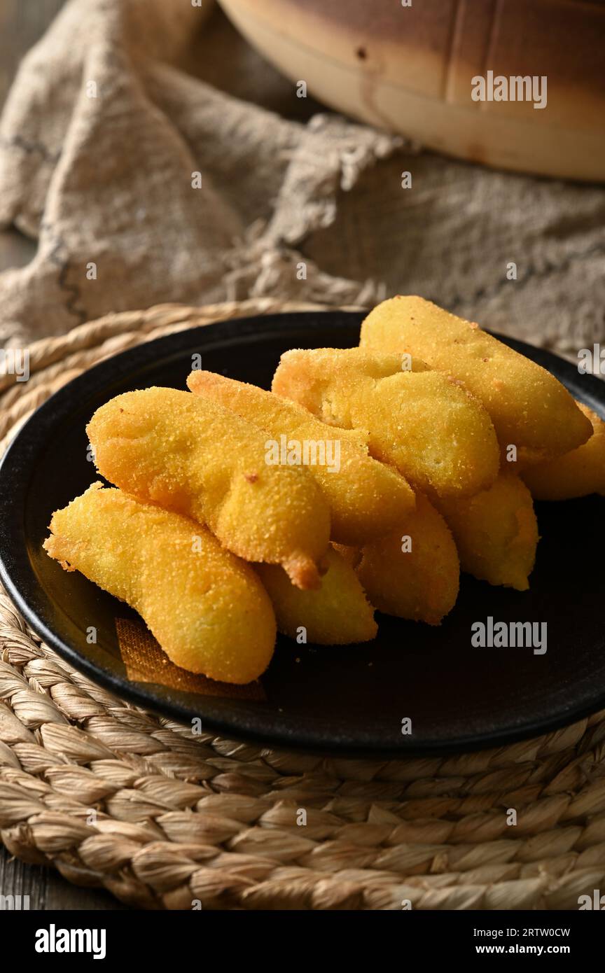 deep Fried banana in White plate- Traditional asian dish, Chinese ...