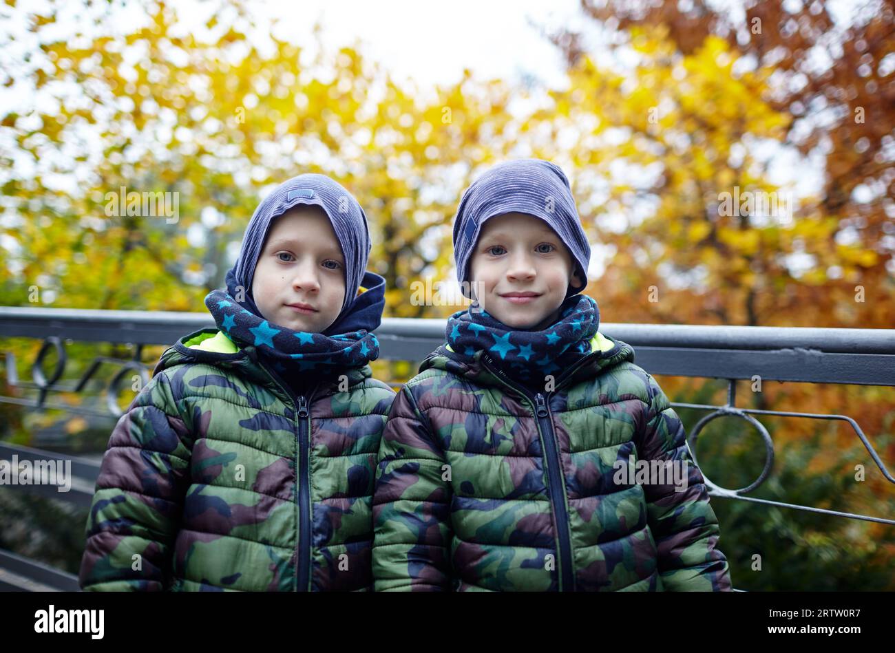 Hello october. Portrait of a cute kids in autumn park. Ñhildren having ...