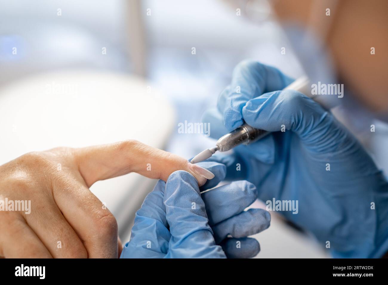 Female hands and tools for manicure, process of performing manicure ...