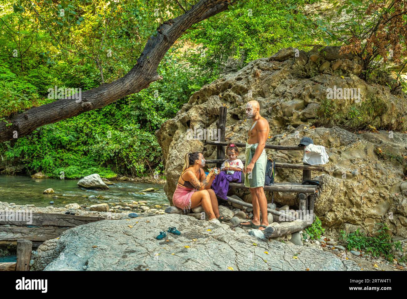 Families bathe in the thermal and sulfur springs of Lu Vurghe near ...
