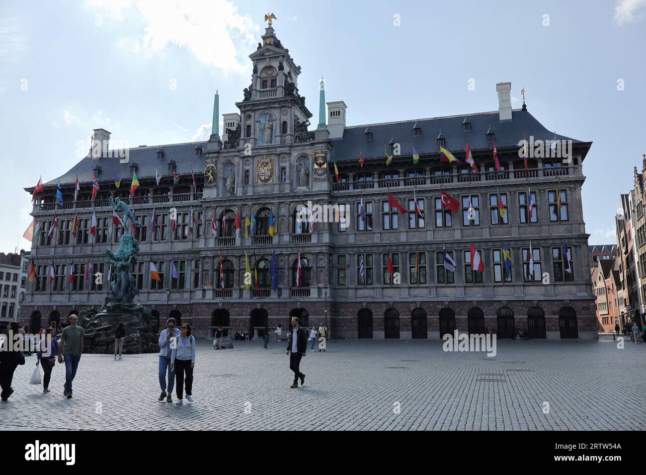 The famous city hall of Antwerp on the 21st of july, with the flags of ...