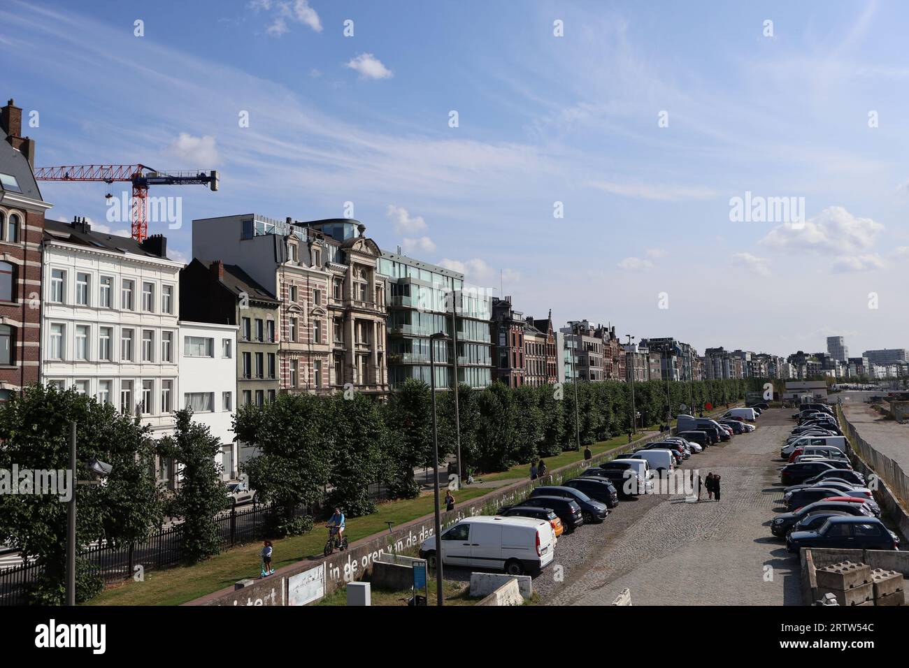 A picture of the buildings on the border of the river Scheldt, on the ...
