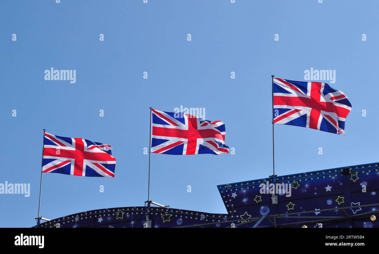 Row of union flags flying over funfair at Hunstanton, England, UK Stock ...