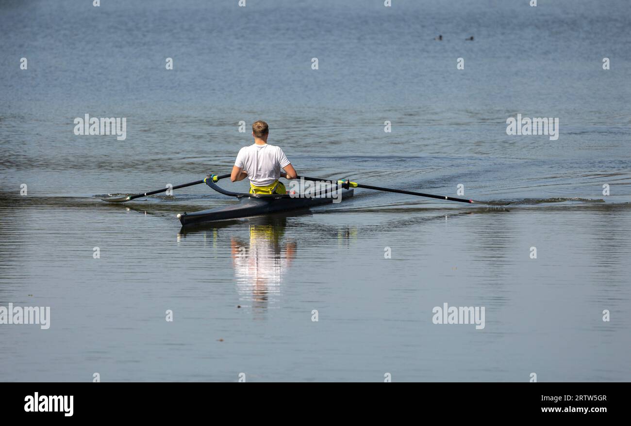 Man Rowing, Canoeing, Kayaking a kayak over river Stock Photo - Alamy