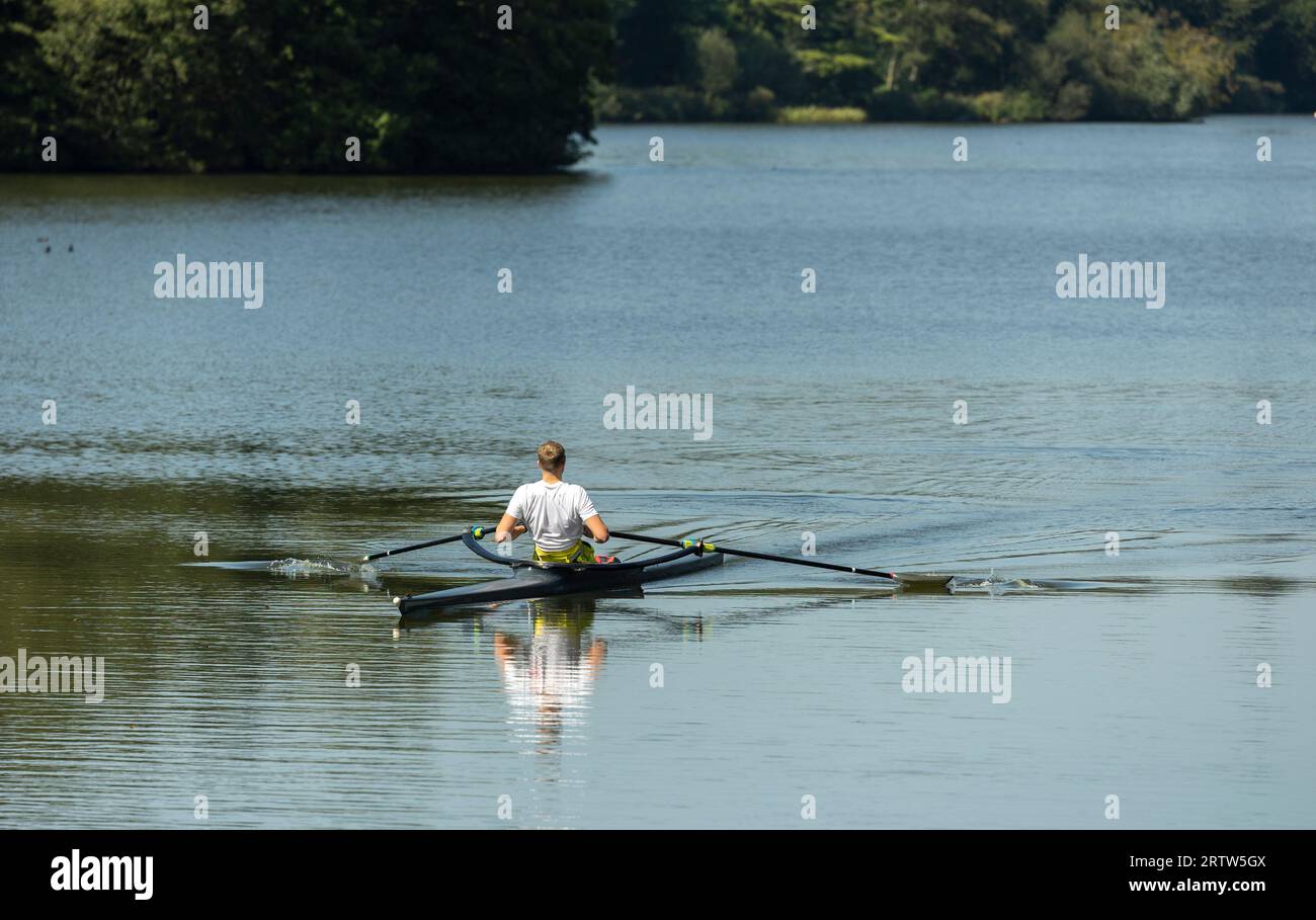 Man Rowing, Canoeing, Kayaking a kayak over river Stock Photo - Alamy