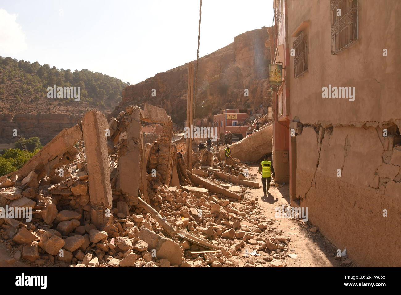 Al Haouz, Morocco. 14th Sep, 2023. Rescuers work at ruins after an ...