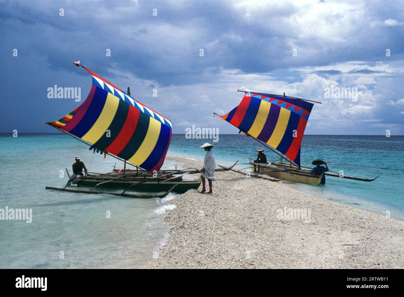 Outriggers on Pink Island Stock Photo - Alamy