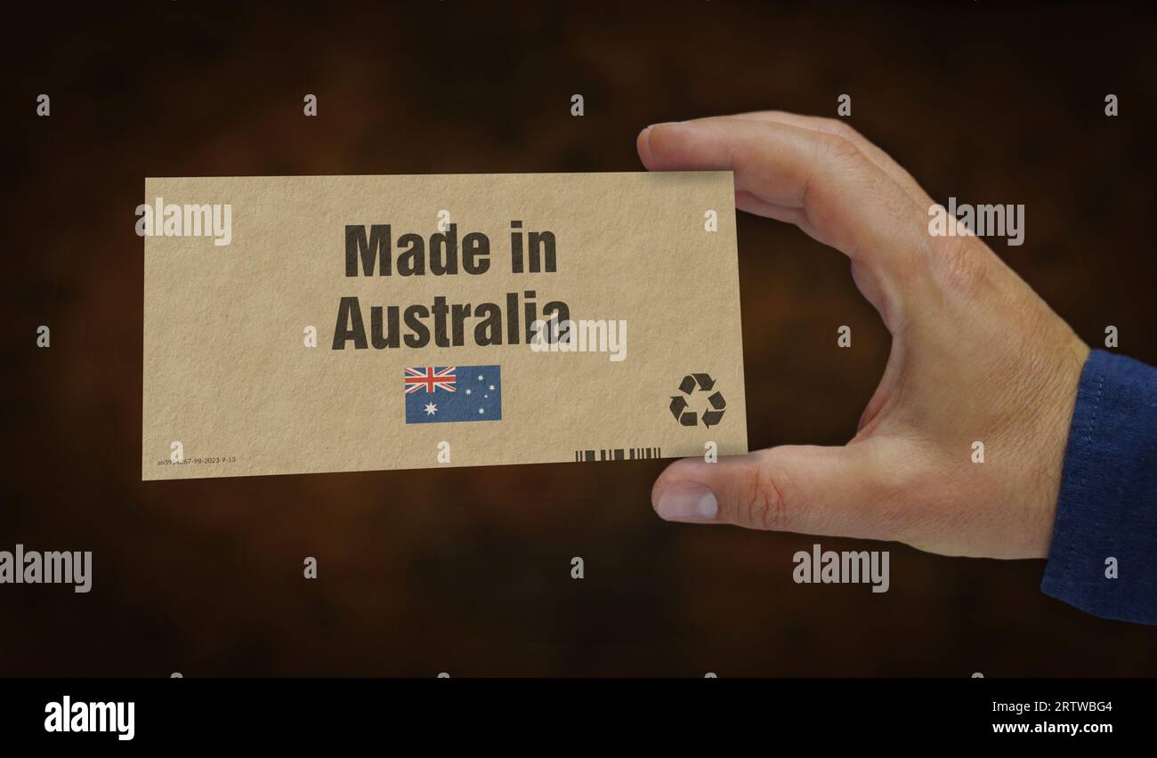 Made in Australia box in hand. Manufacturing and delivery. Product ...