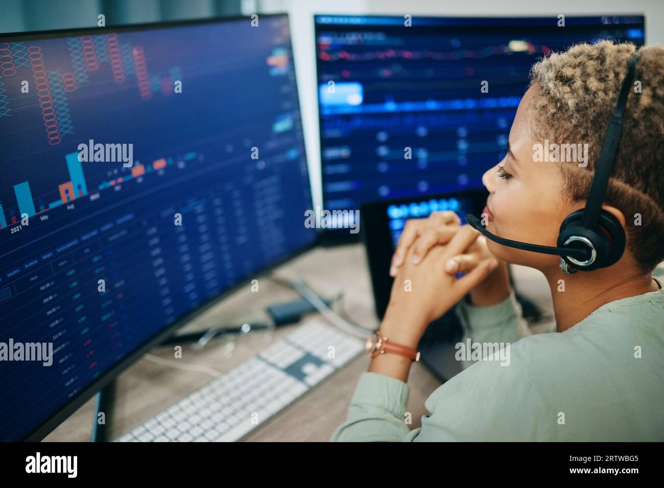Business, computer screen and woman with investment, headphones and connection with data ...