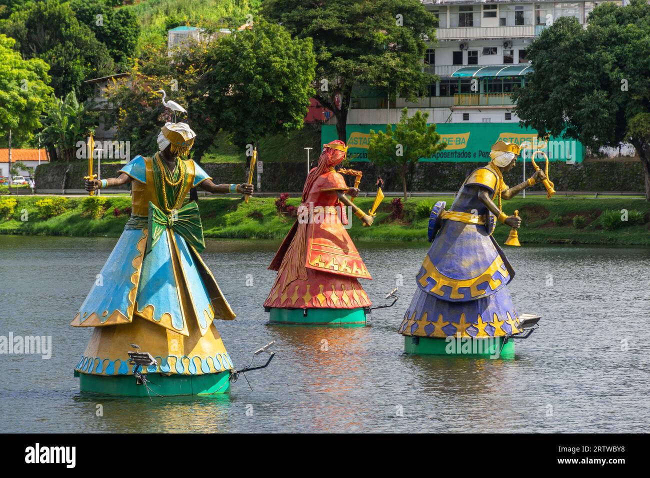 Beautiful view to statues of african religion gods on lake in Salvador ...