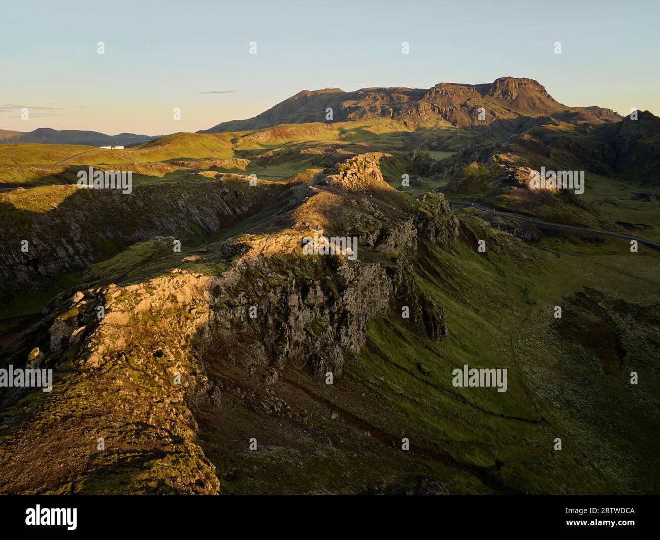 Mountain formations with steep slopes in daylight Stock Photo - Alamy