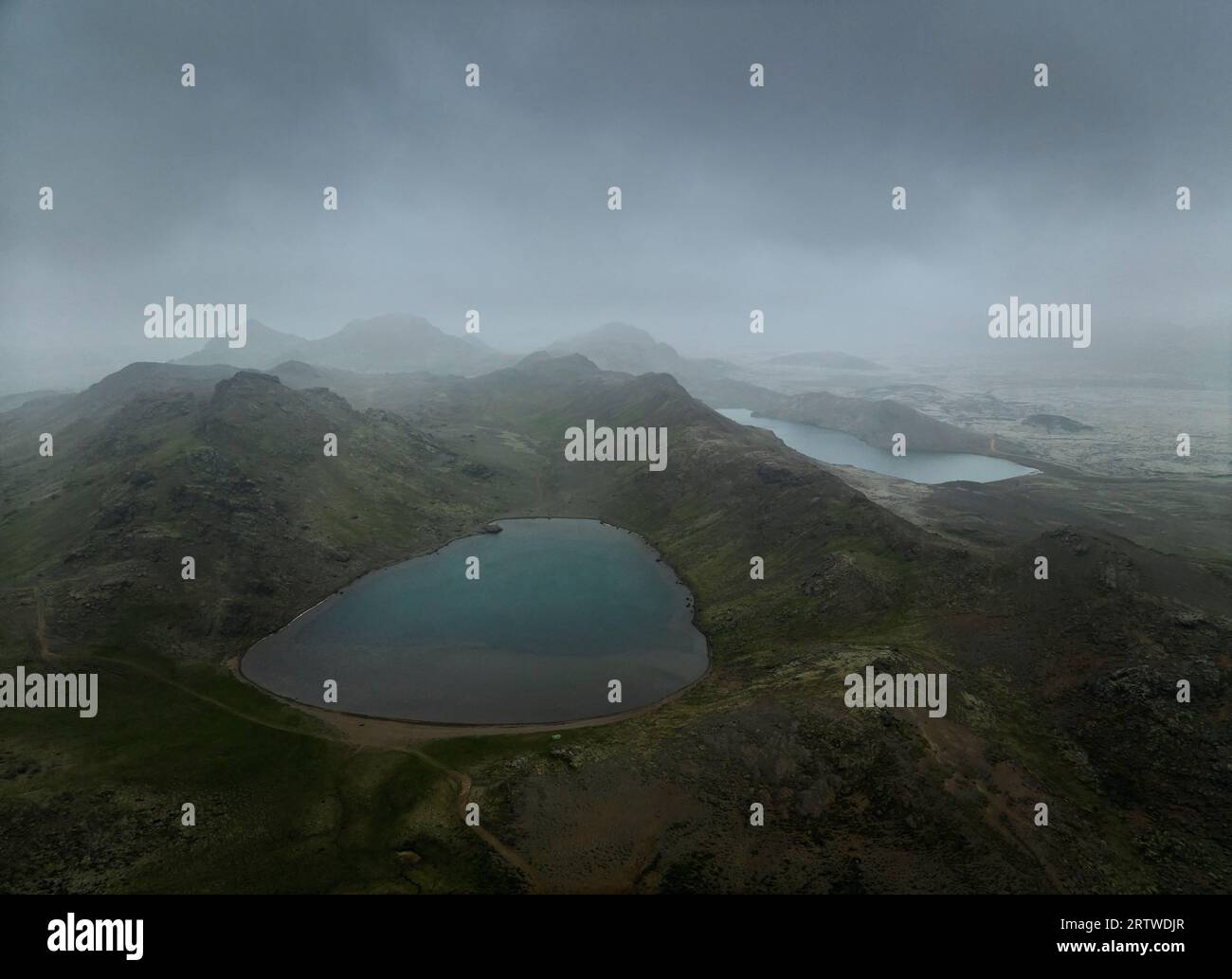 Drone view of amazing blue water lake in mountainous region Stock Photo ...