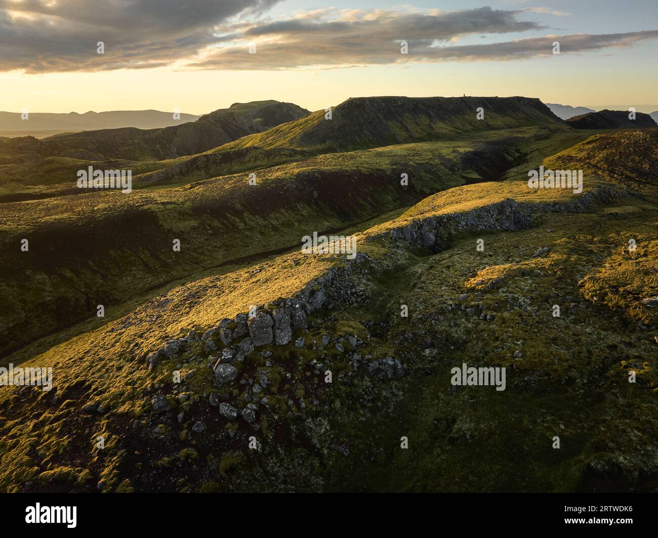 Mountainous terrain with dry grass and rocky slopes Stock Photo - Alamy