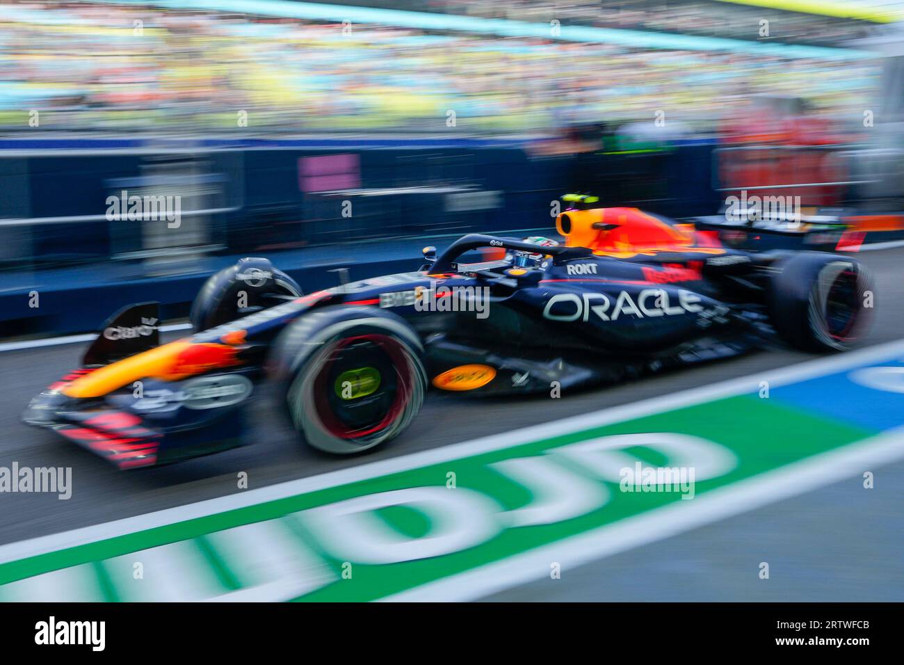 Red Bull driver Sergio Perez of Mexico steers his car down port lane during the first practice ...