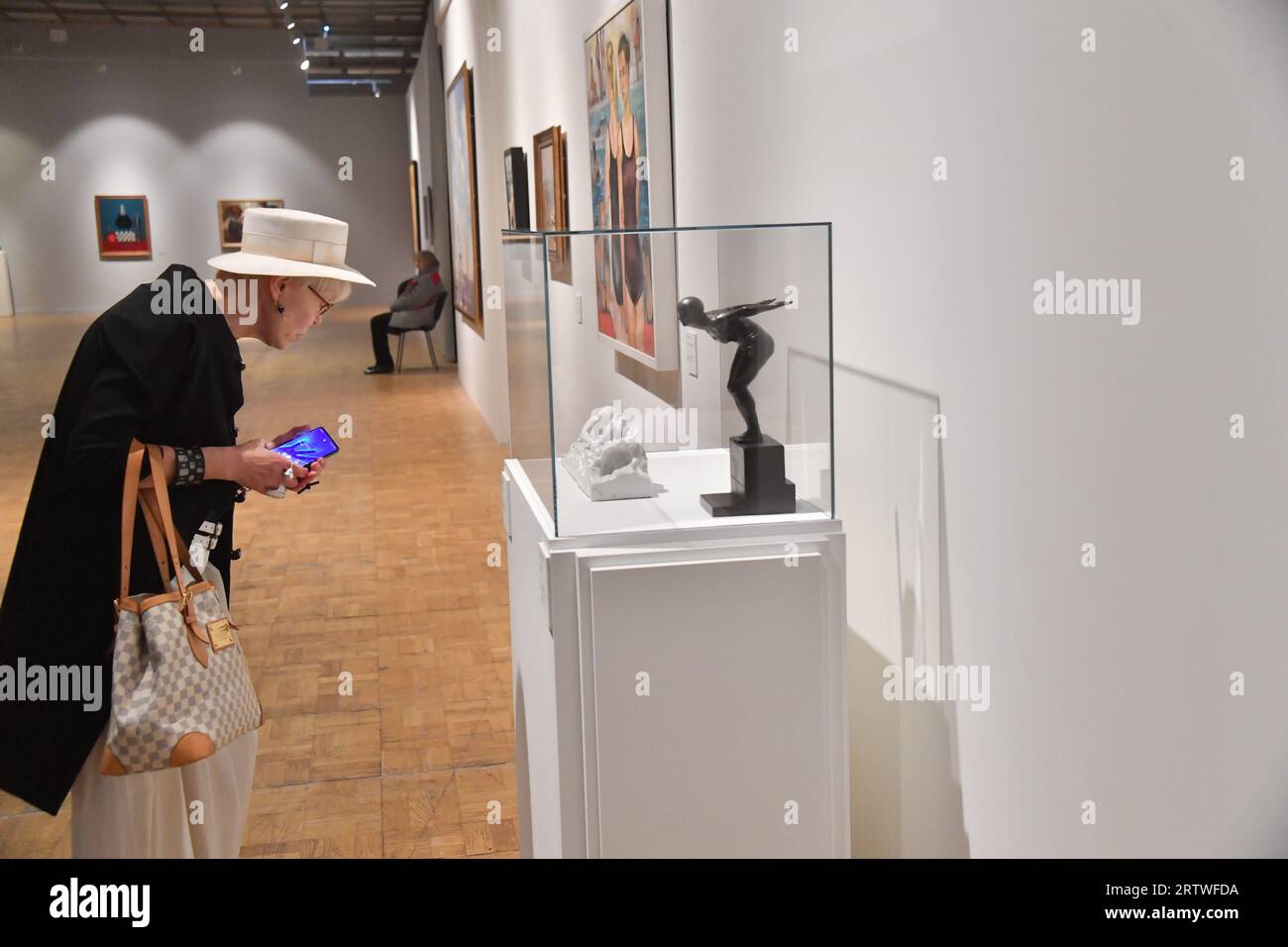 Moscow. A visitor at the exhibition `Century of Sports. To the 100th ...