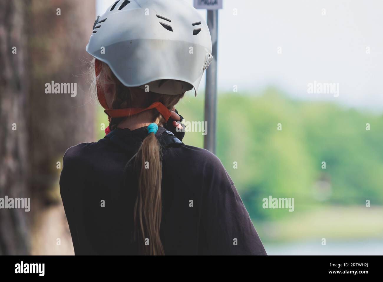 View of high ropes course, kids of climbing in amusement acitivity rope ...