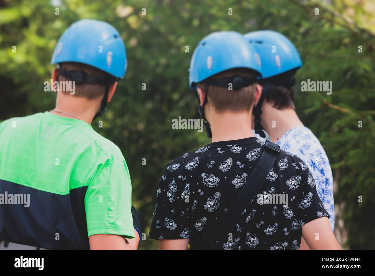 View of high ropes course, kids of climbing in amusement acitivity rope ...