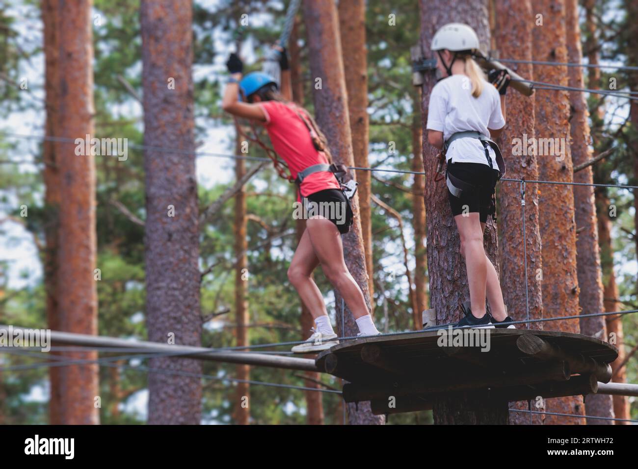 View of high ropes course, process of climbing in amusement acitivity ...