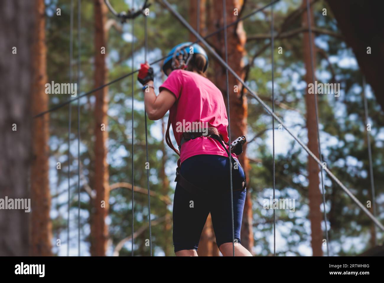 View of high ropes course, process of climbing in amusement acitivity ...