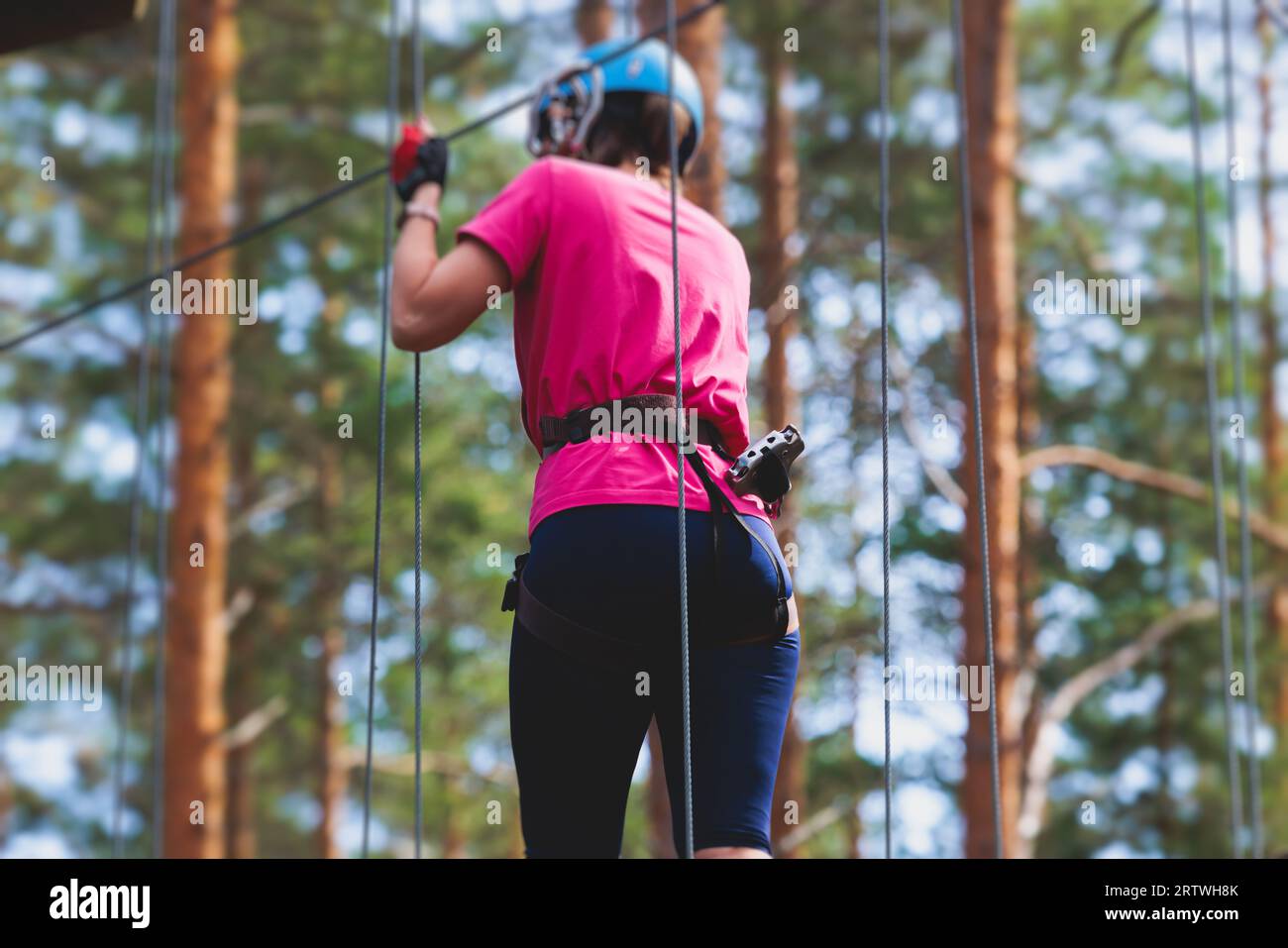 View of high ropes course, process of climbing in amusement acitivity ...